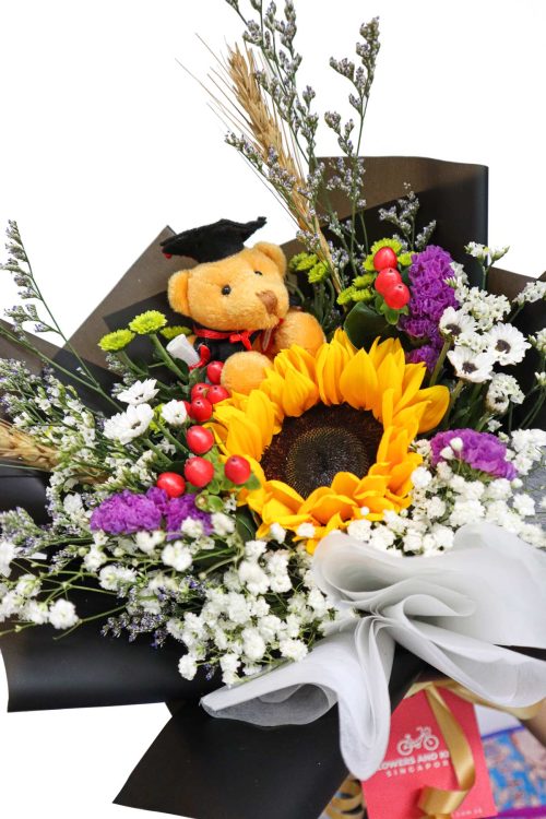 Daisy Snorlax Graduation Bouquet | Flowers and Kisses